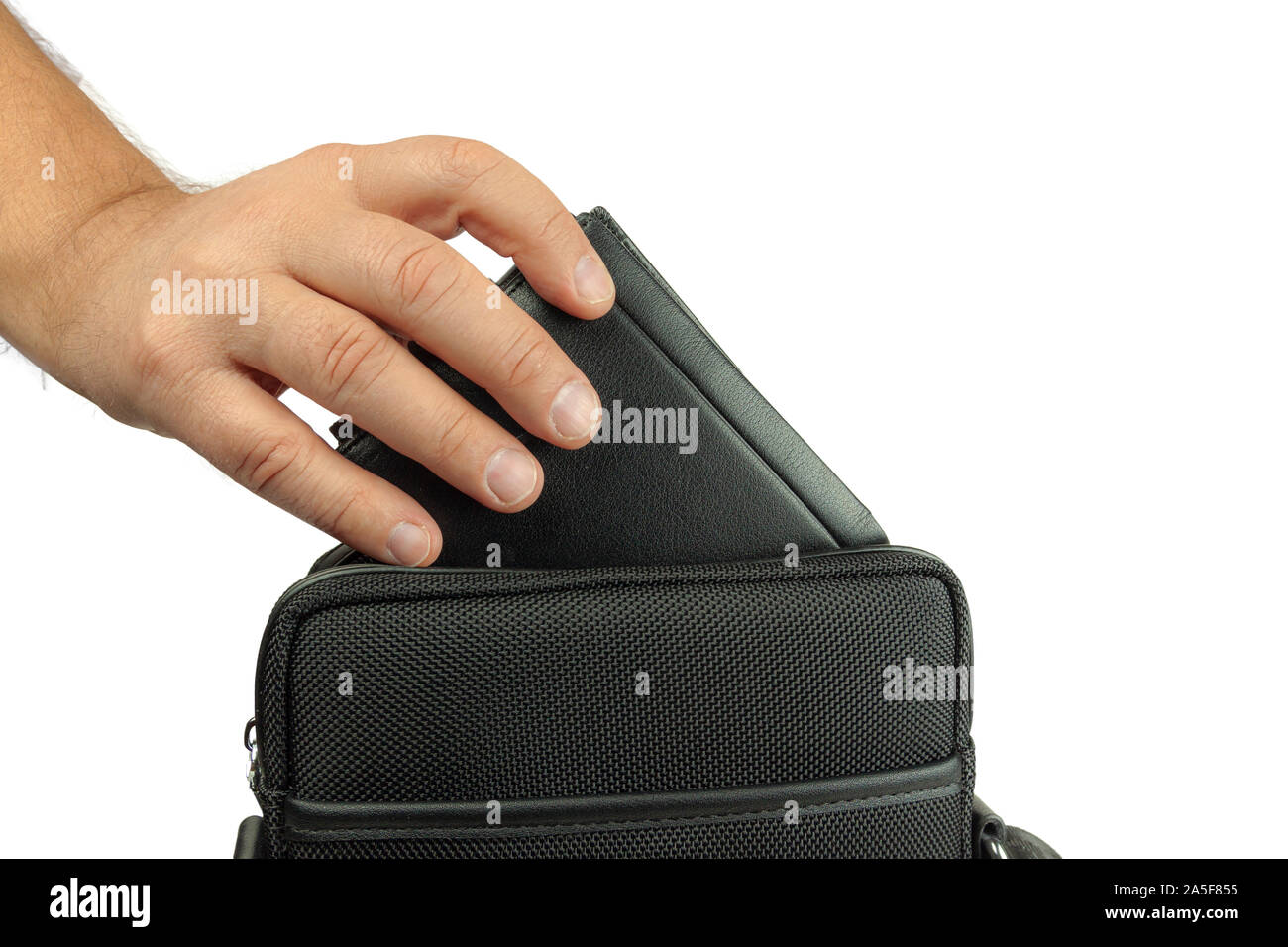 The hand pulls out, puts the wallet out of the bag. On white background ...