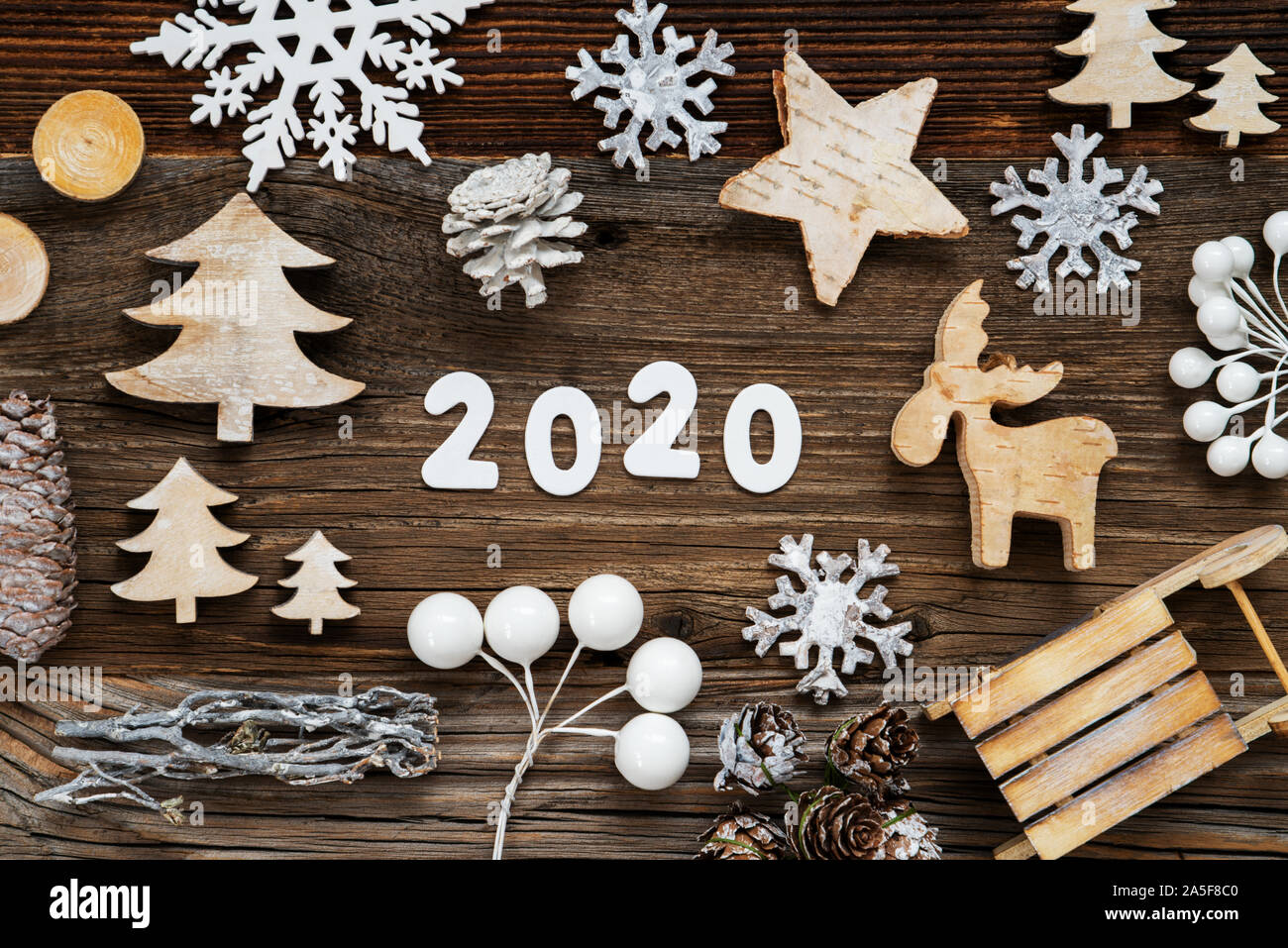 Rustic Wooden Christmas Decoration, 2020, Tree, Fir Cone And Sled Stock ...