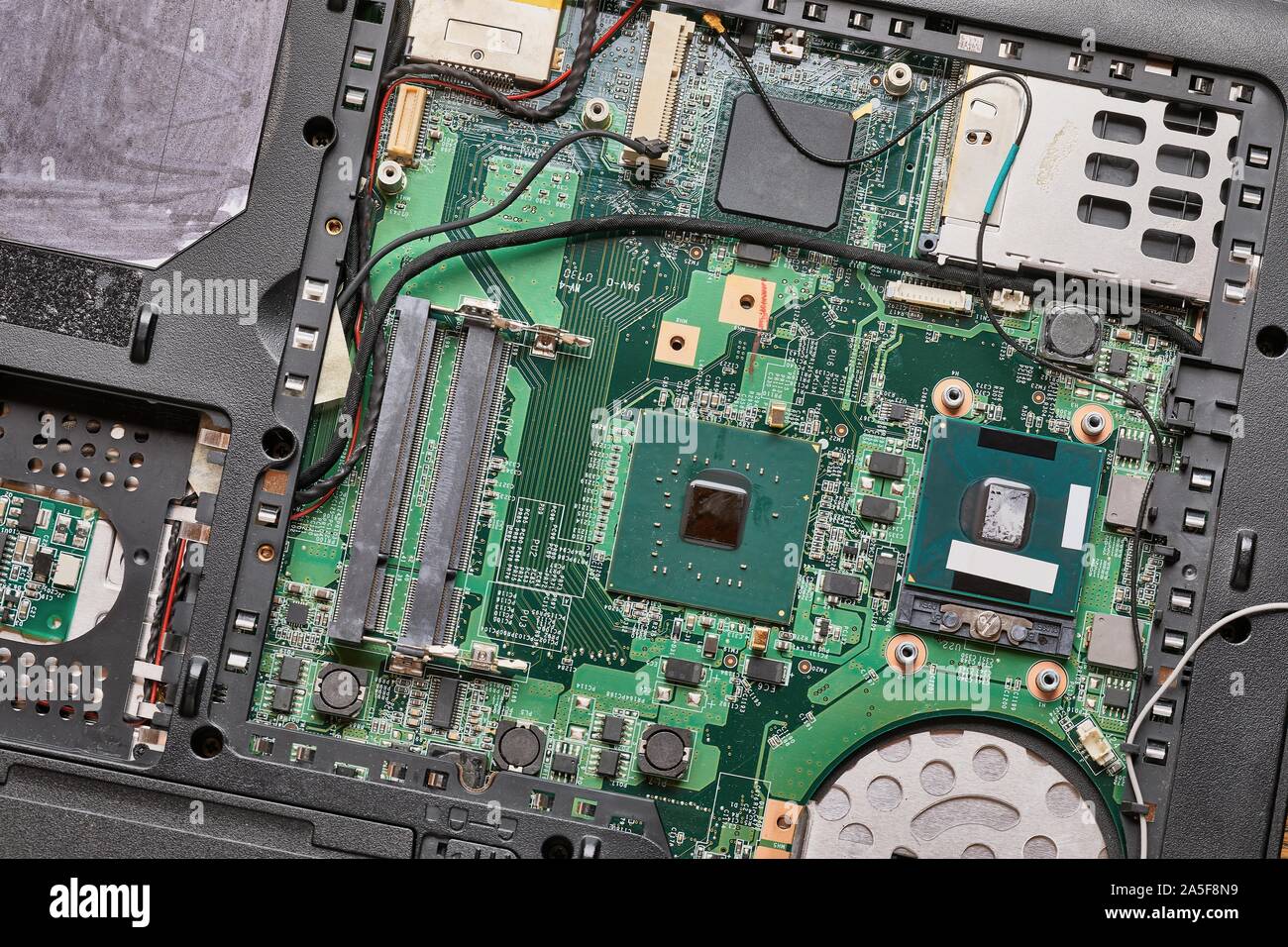 Circuit board closeup, laptop interiors Stock Photo - Alamy