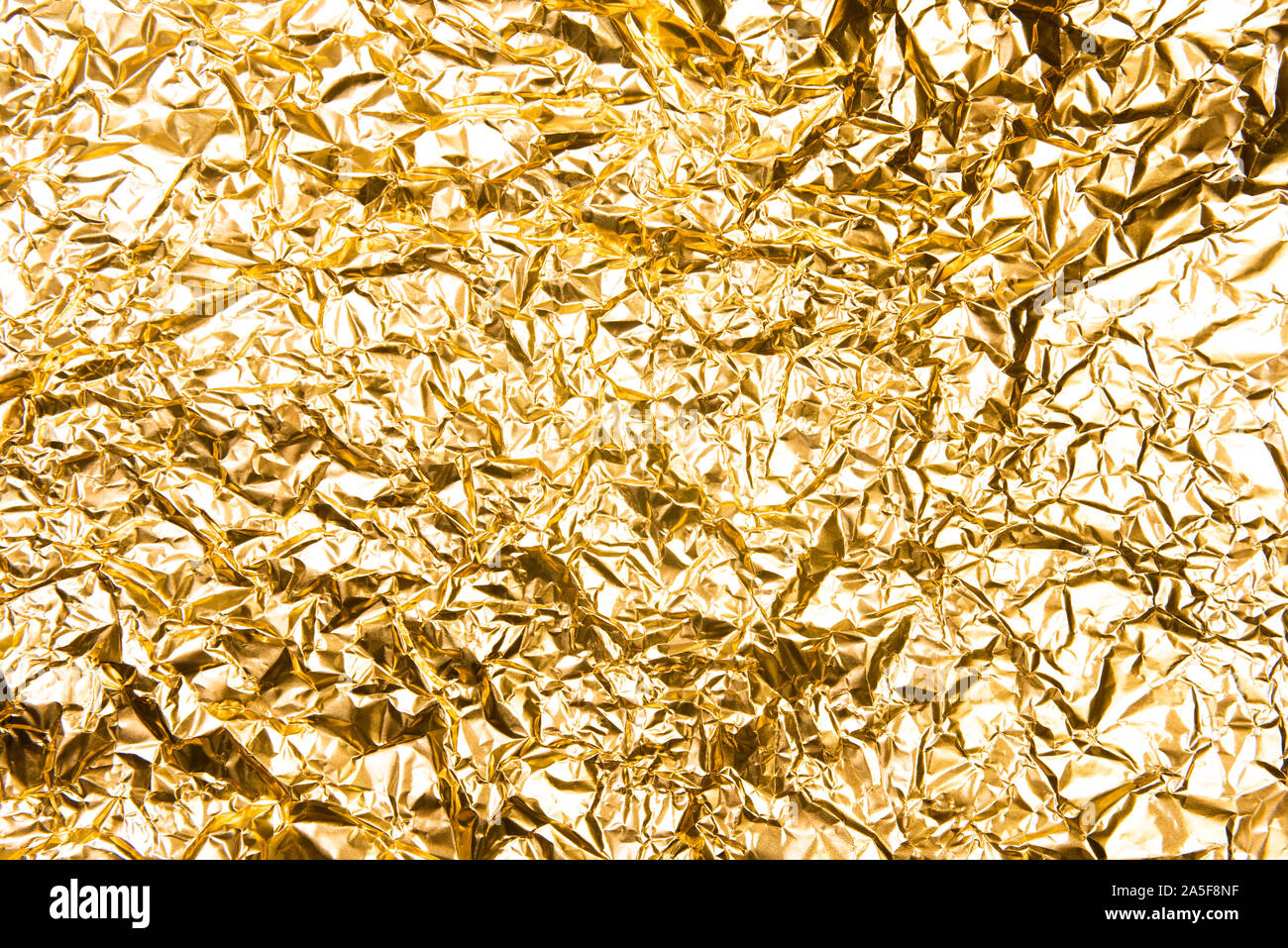 Shiny wrinkled metal foil abstract texture background. Greeting card ...