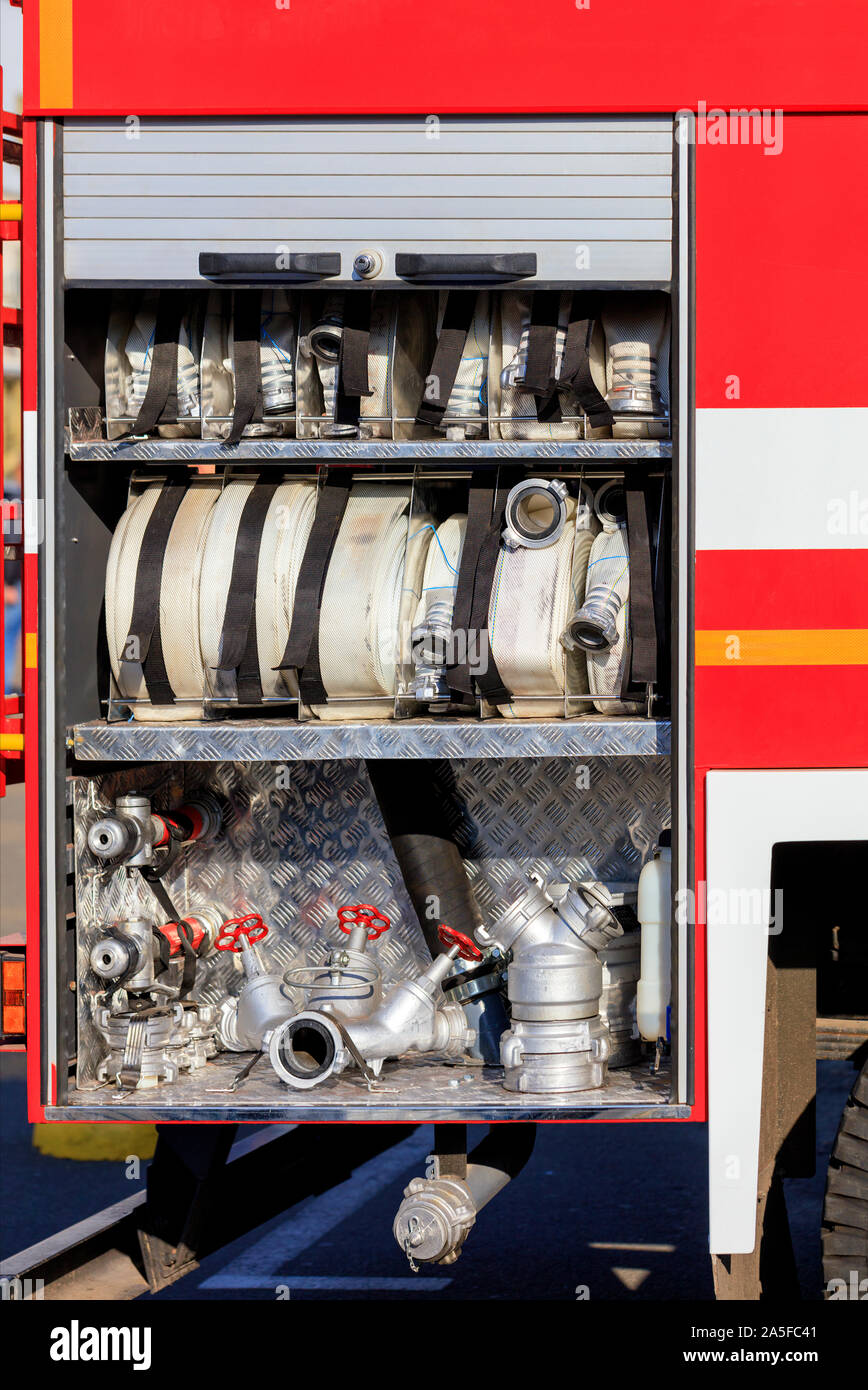 Fire hoses, valves and cranes are located in the cargo compartment of ...