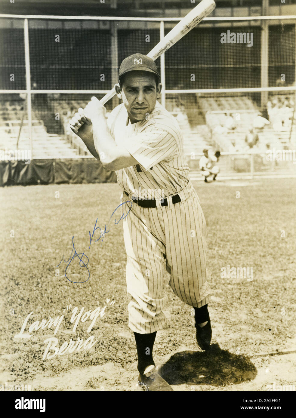 1940's era black and white photo depicting a young Larry Yogi Berra who ...