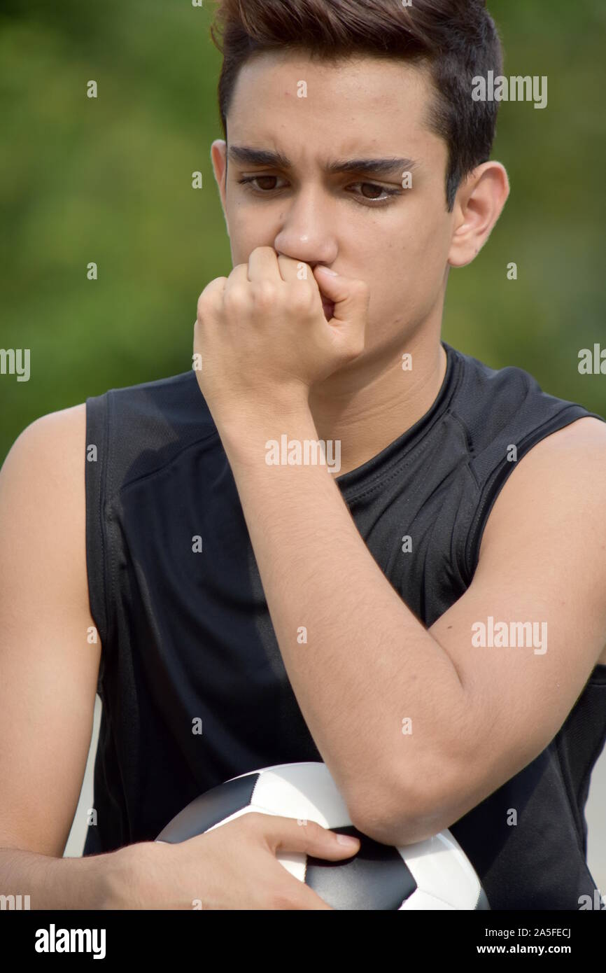 Fit Male Soccer Player And Confusion Stock Photo - Alamy