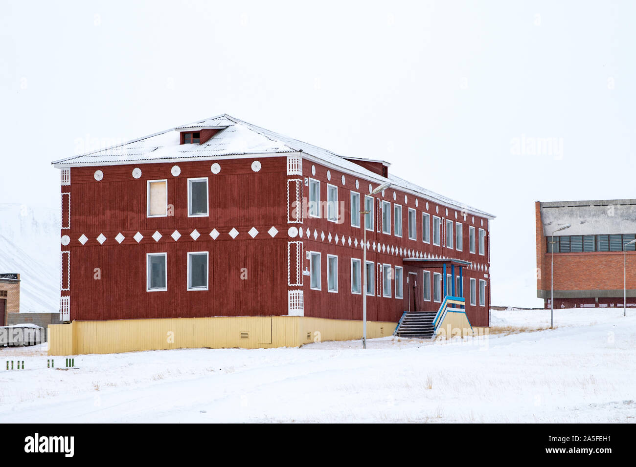 Pyramiden, Norway - August 2017: Old, red painted abandoned building in ...