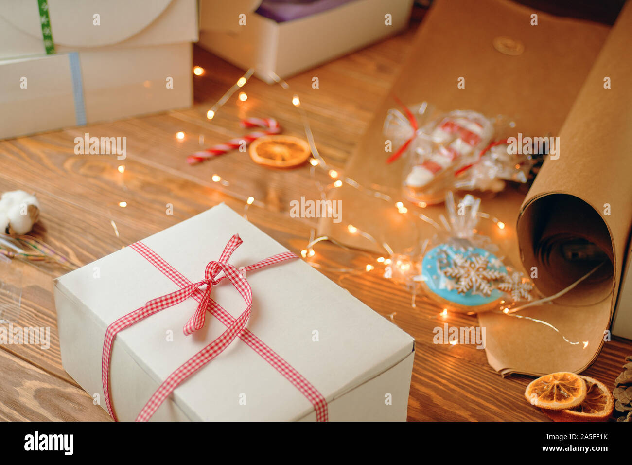 Christmas composition with present box. A Christmas gift box with a red ...