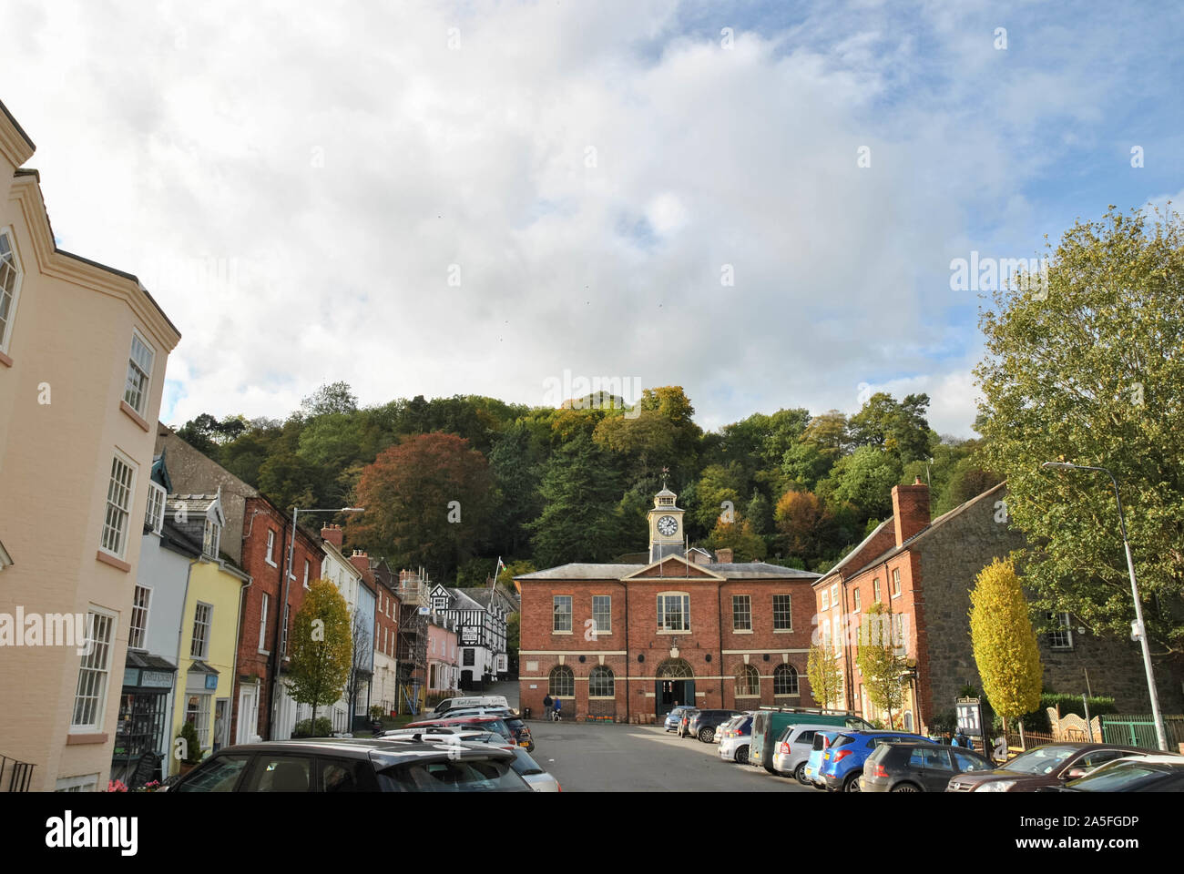 Montgomery Town Square showing the Town Hall and hill with trees behind ...