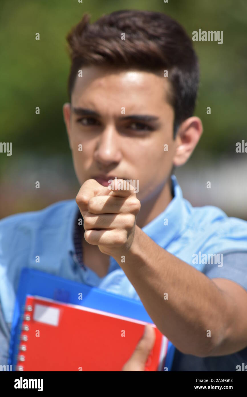 Male student pointing school hi-res stock photography and images - Alamy
