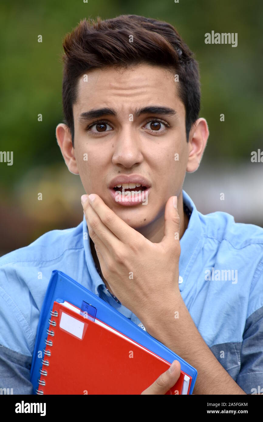 Minority Male Student And Confusion Stock Photo - Alamy