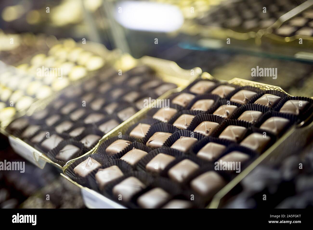 Closeup shot of chocolates in a box with a blurred background Stock ...