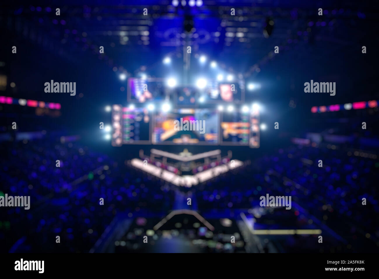 Blurred background of an esports event - Big illuminated main stage of ...