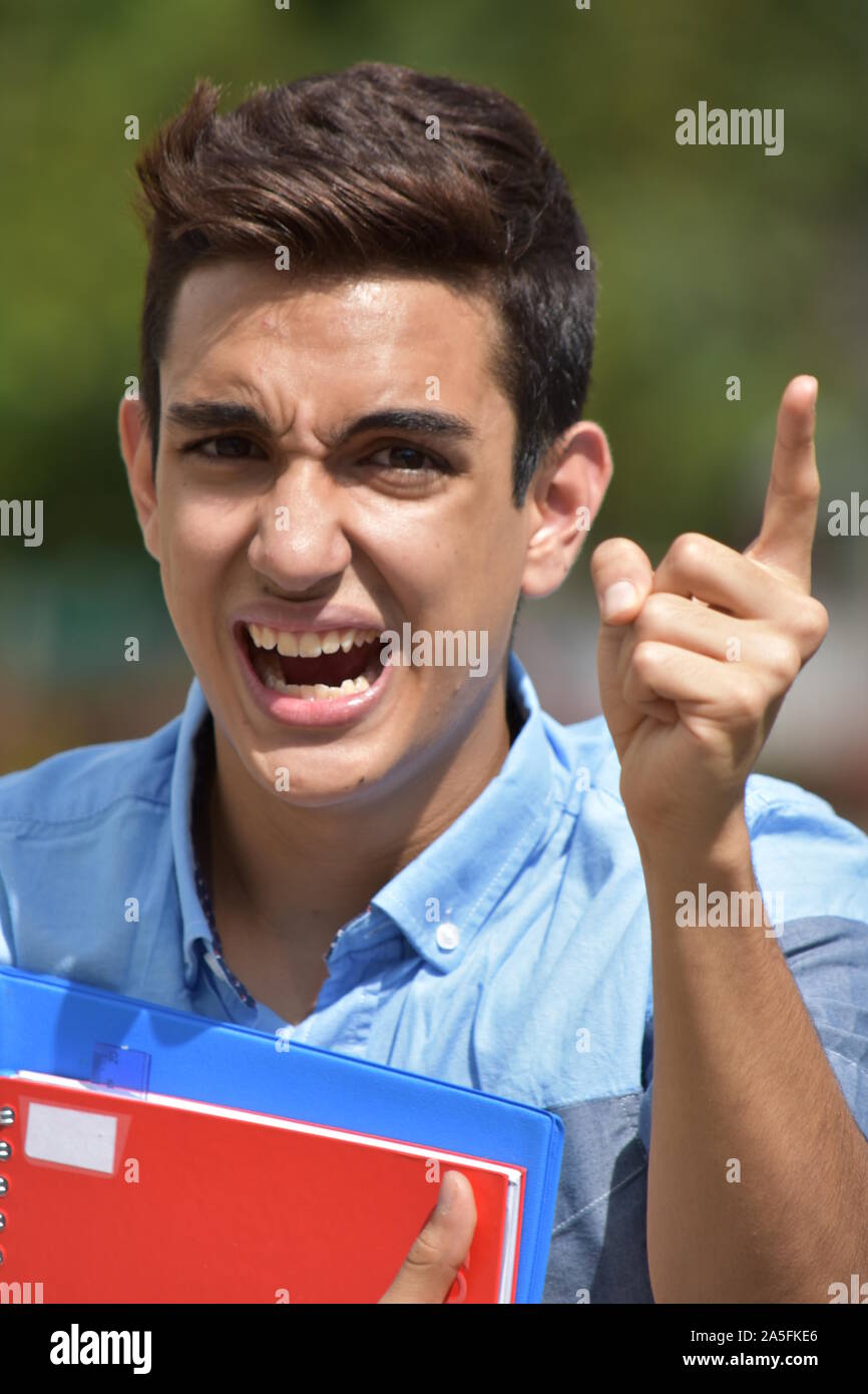 Young Boy Student And Anger Stock Photo - Alamy