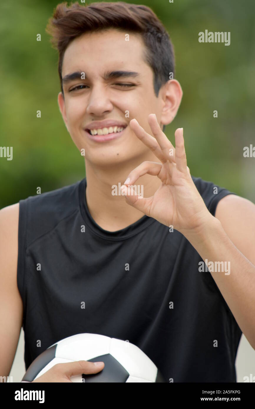 Male Soccer Player And Okay Sign Stock Photo - Alamy