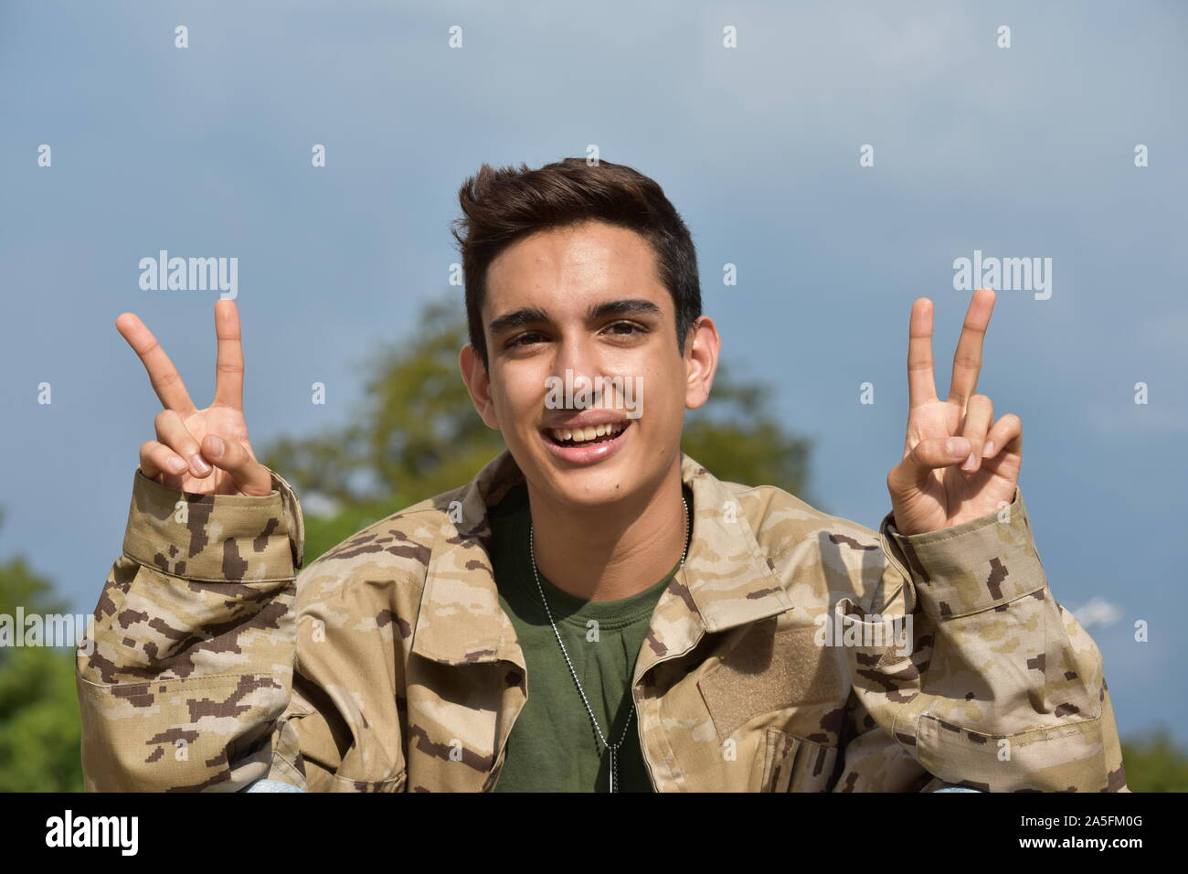 Male Soldier And Peace Sign Stock Photo - Alamy