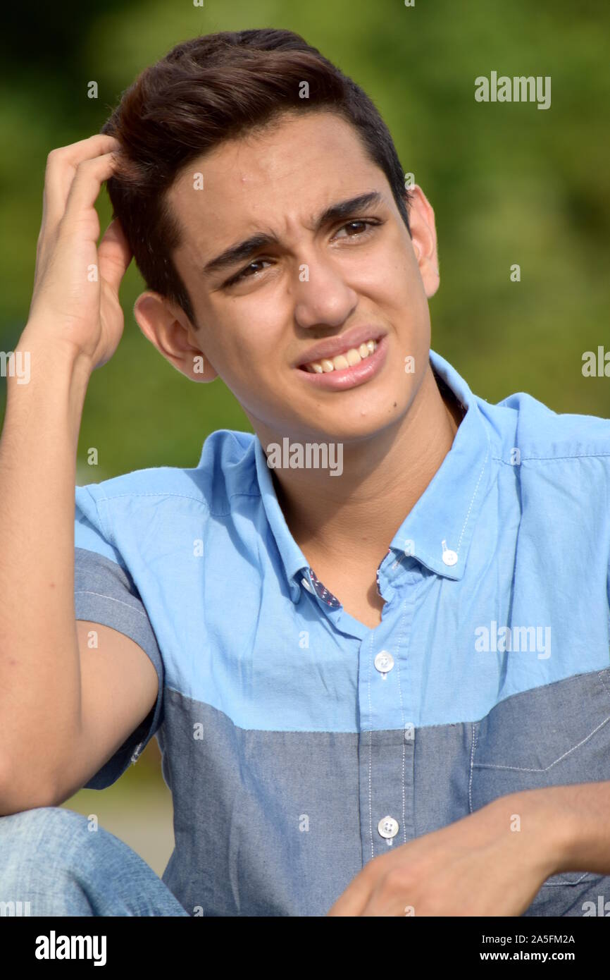 Confused Teenage Boy Stock Photo - Alamy