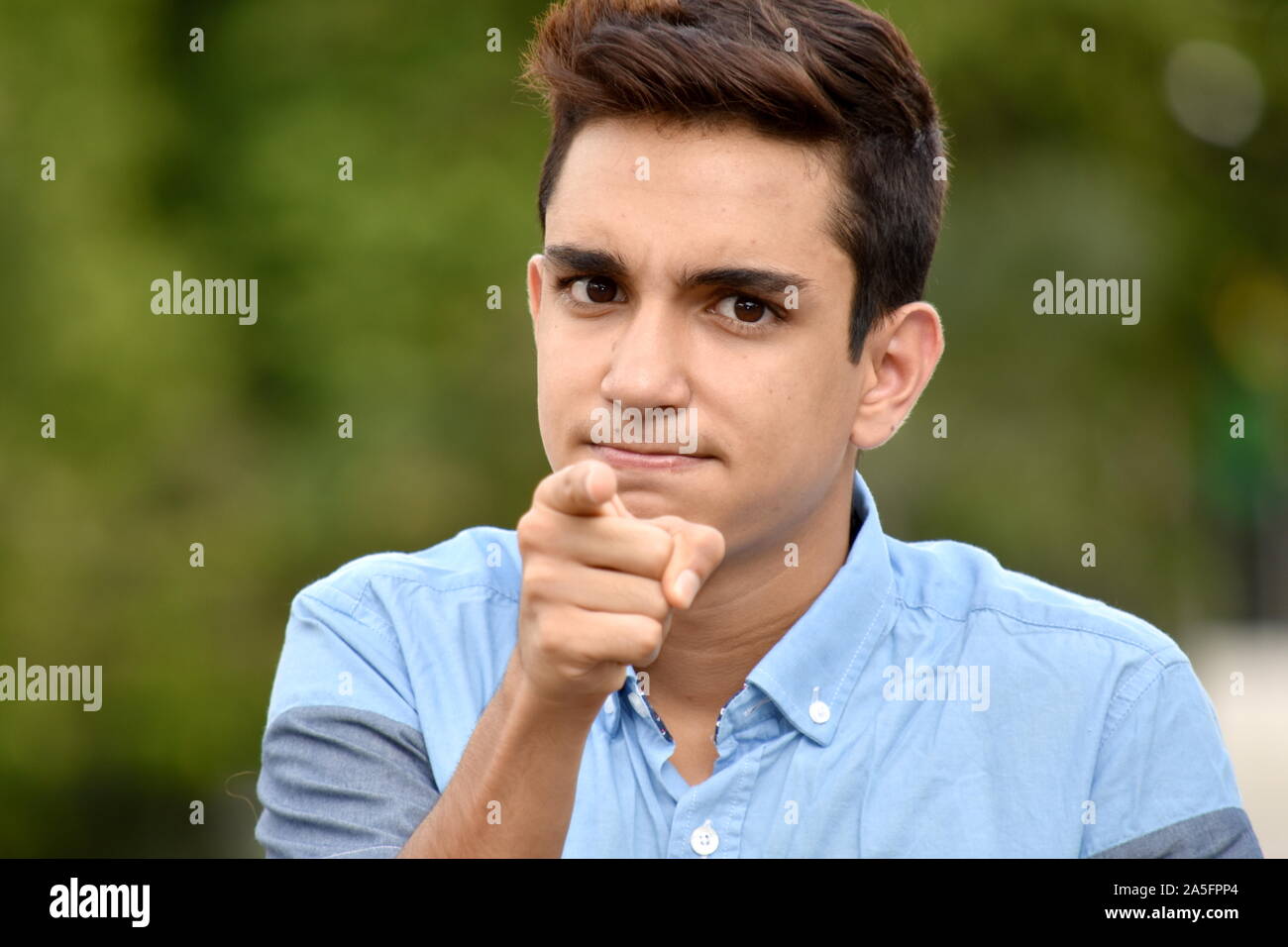 Hispanic teen upset male hi-res stock photography and images - Alamy