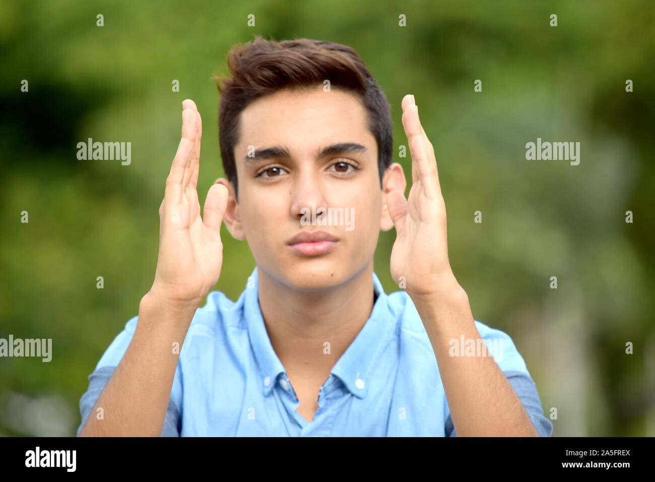 Latino Boy And Small Stock Photo - Alamy