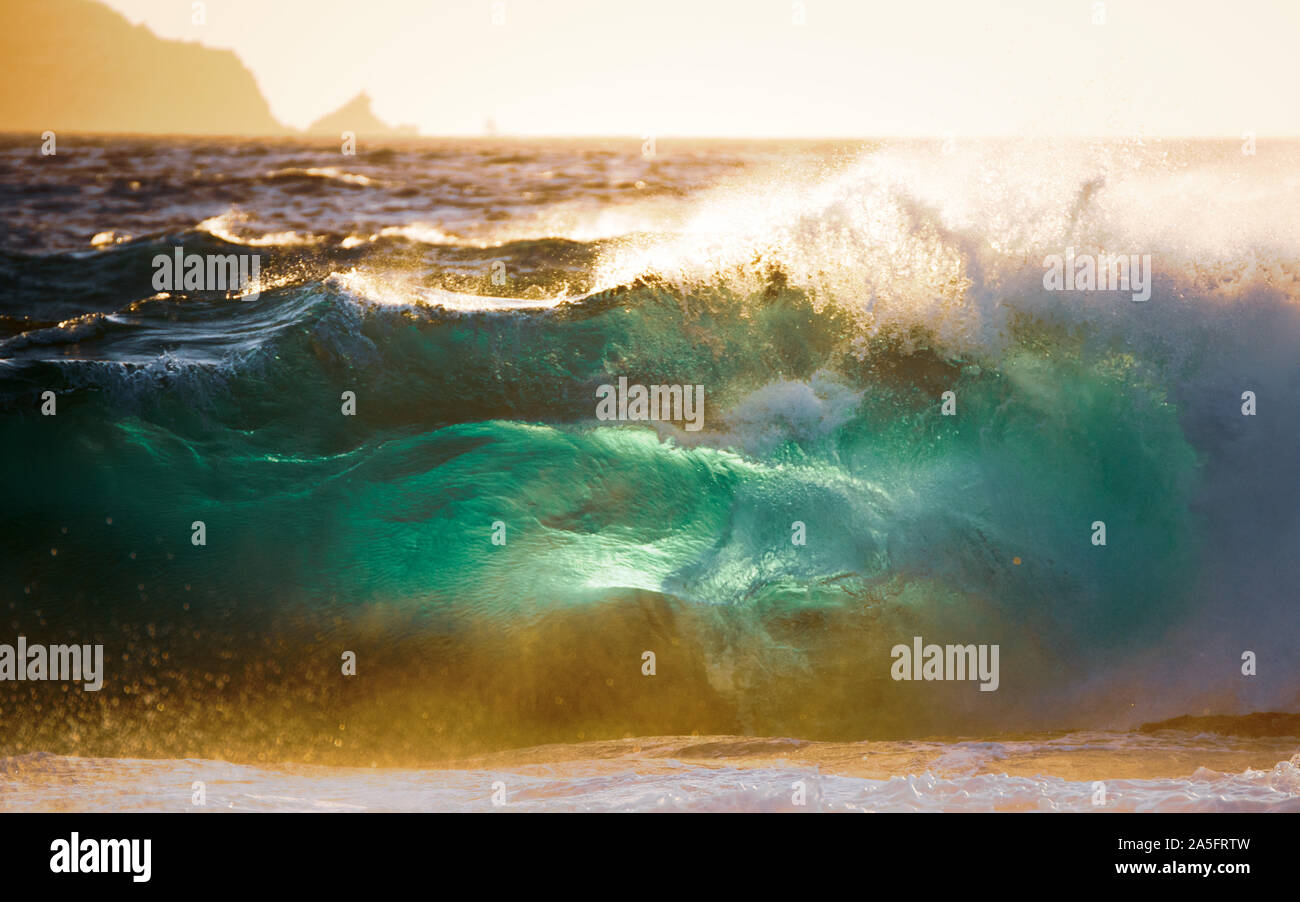 Waves breaking on beach hi-res stock photography and images - Alamy