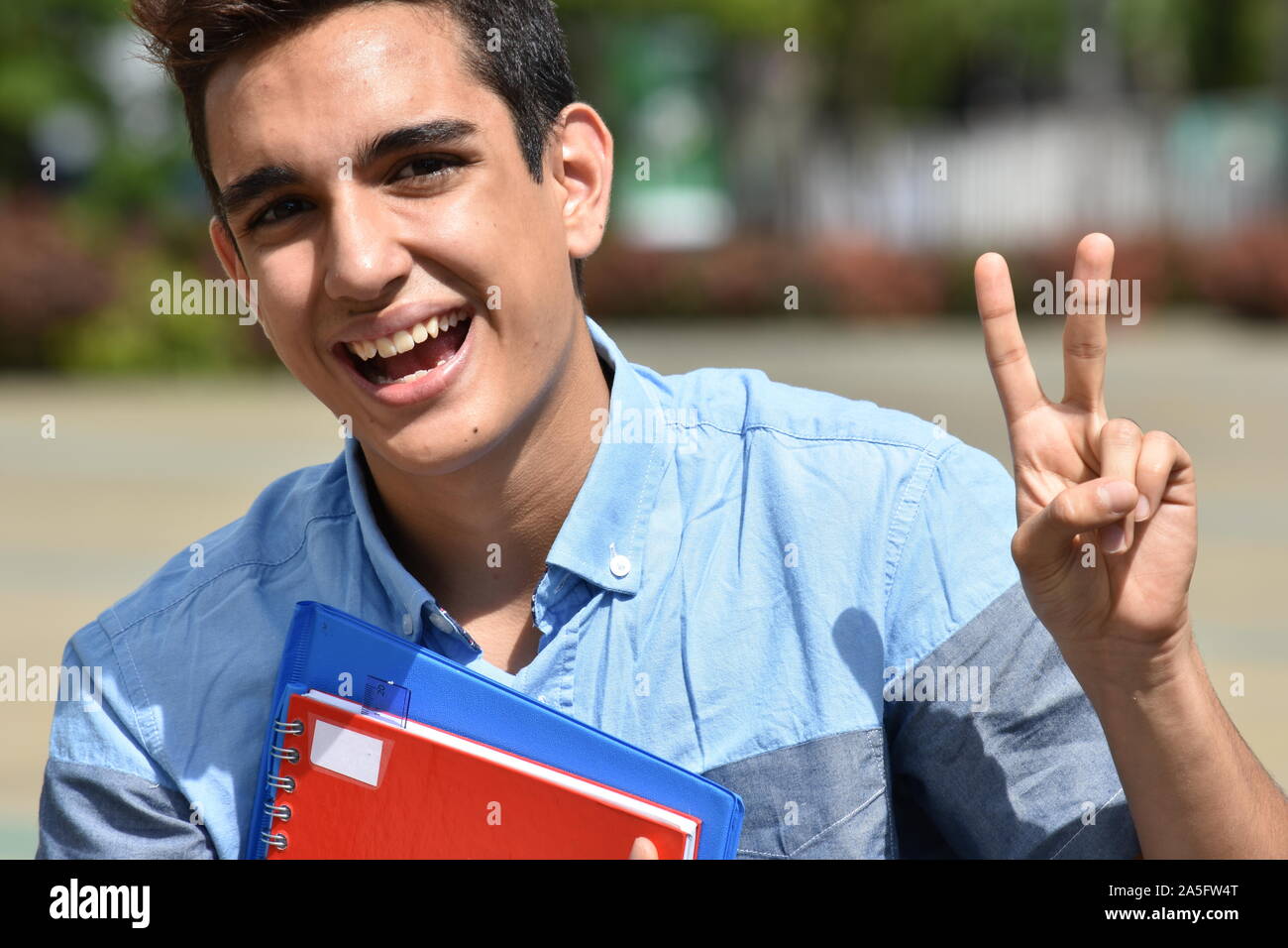 Male student sign hi-res stock photography and images - Alamy