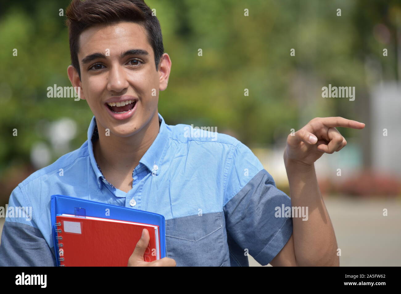 Minority Boy Student Pointing Stock Photo - Alamy
