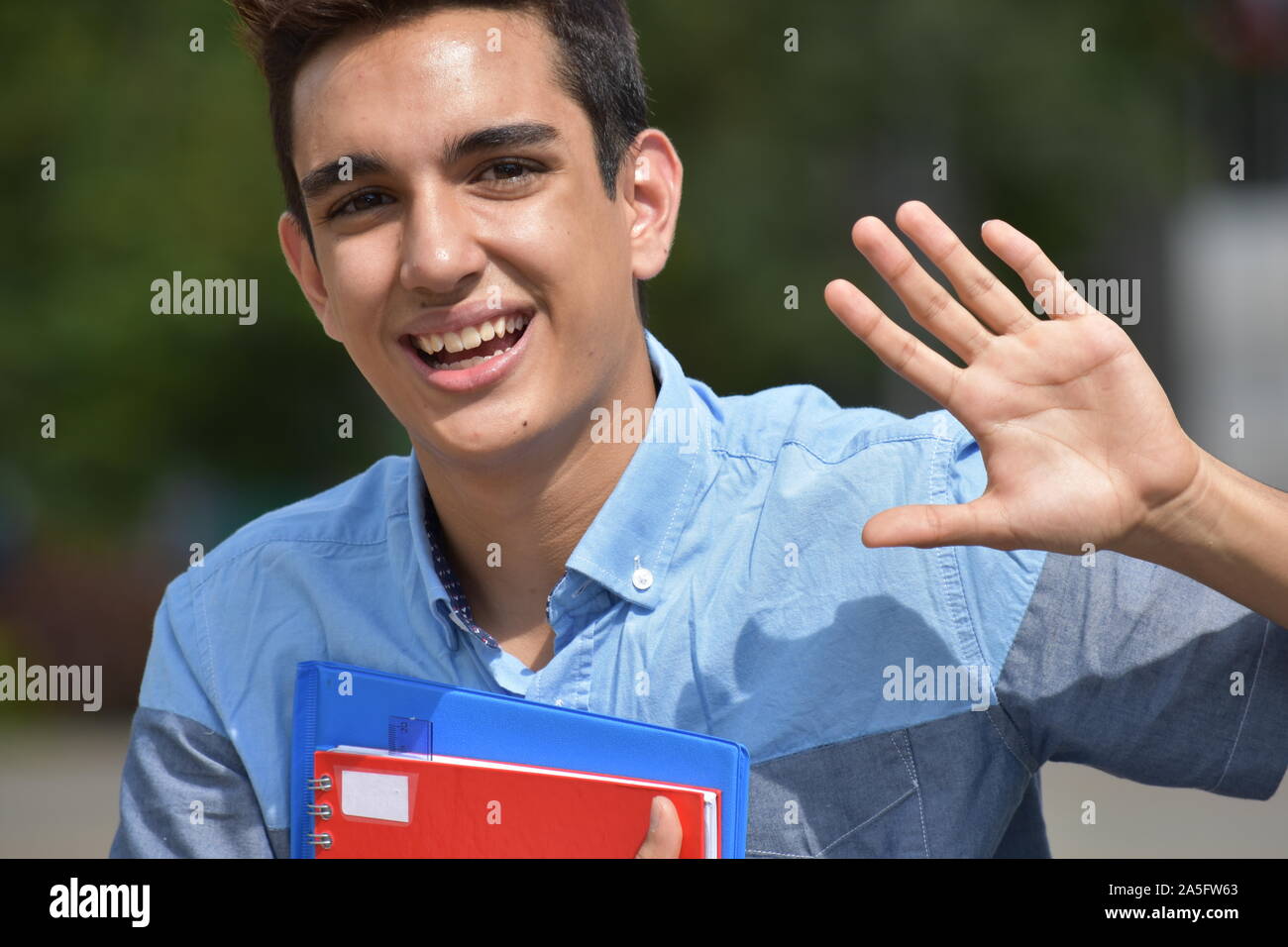 Happy Hispanic Male Student Stock Photo - Alamy