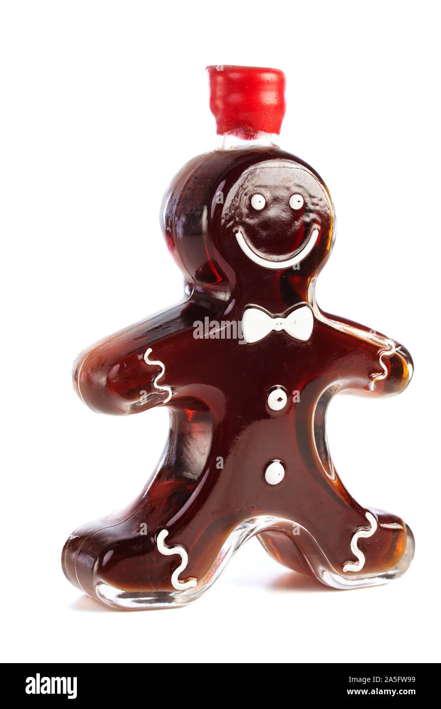 Bottle in the shape of a man with gingerbread syrup on a white ...