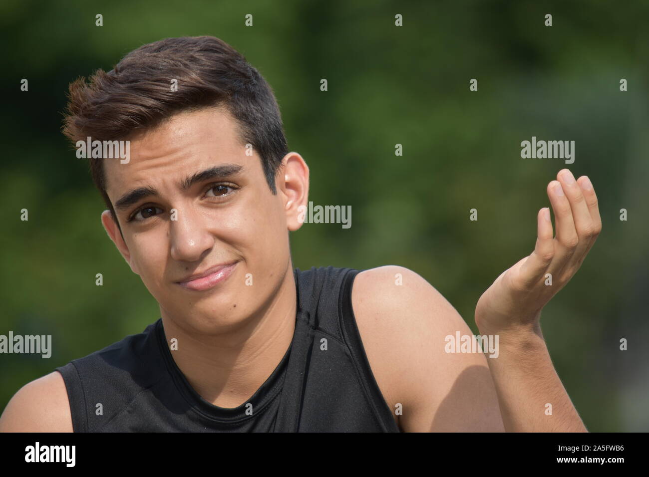 Confused Latino Boy Stock Photo - Alamy