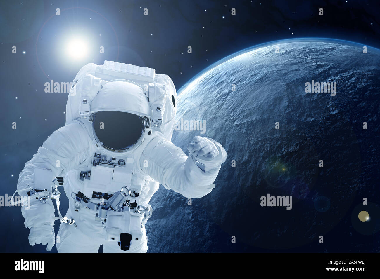 Astronaut on the background of Pluto with the rays of the sun. Elements ...