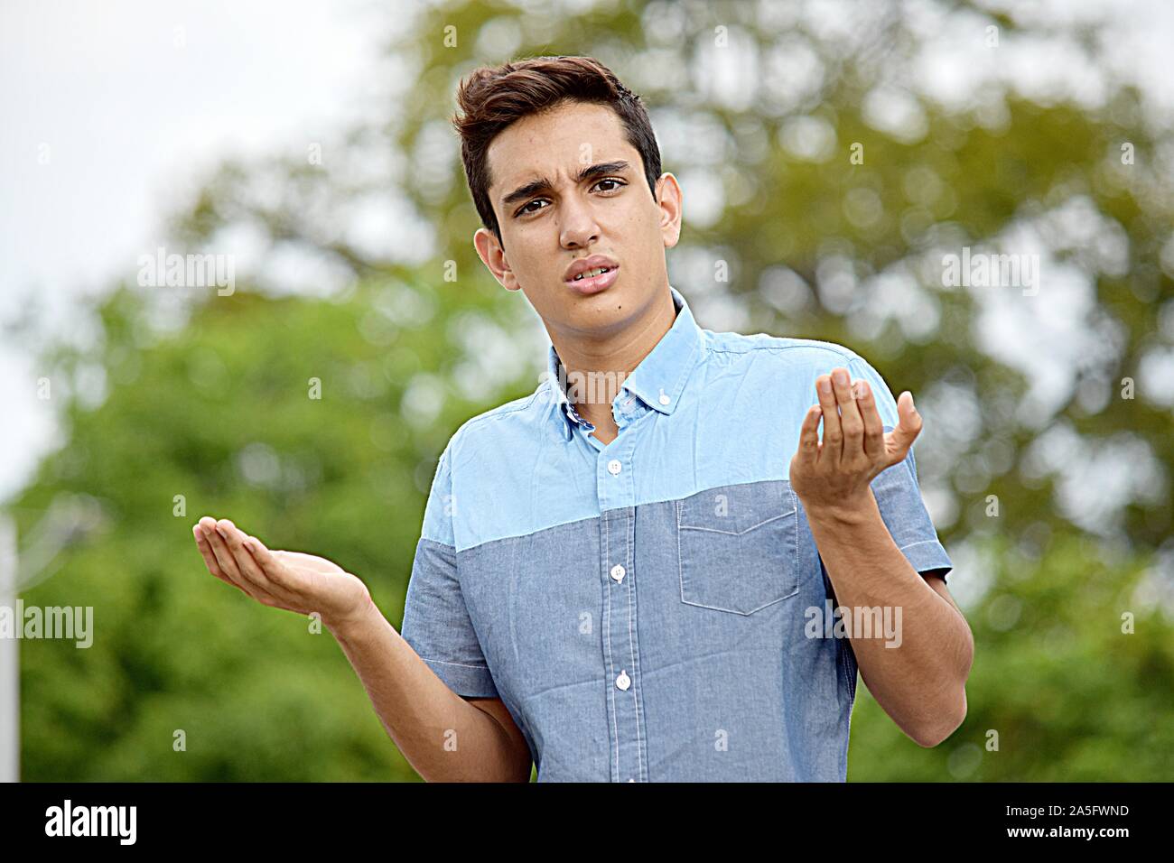 Young Boy And Confusion Stock Photo - Alamy