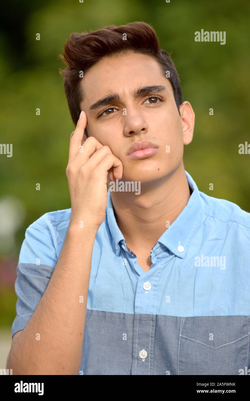 Thoughtful Good Looking Teenage Boy Stock Photo - Alamy