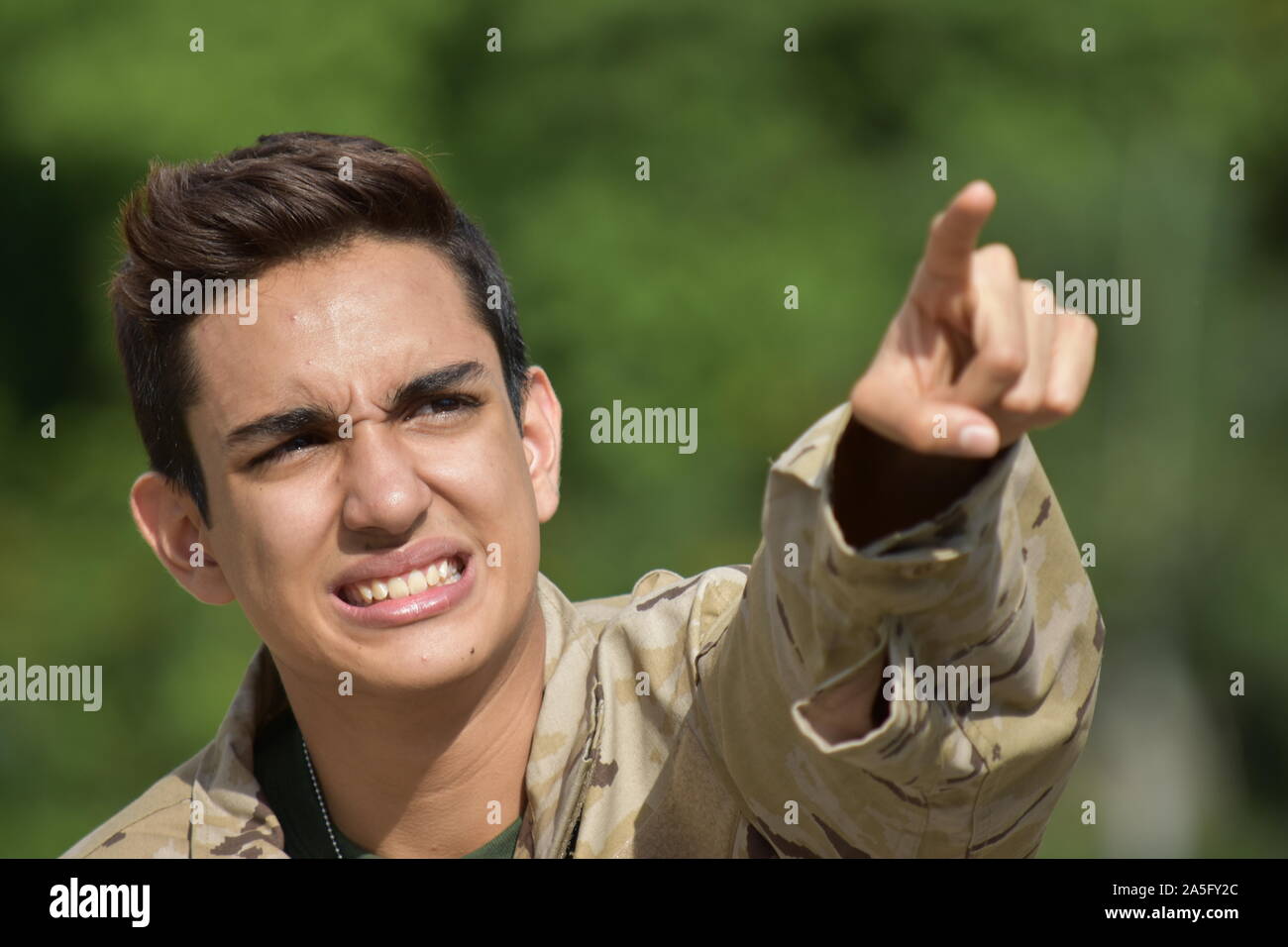 Young Male Soldier Pointing Stock Photo - Alamy