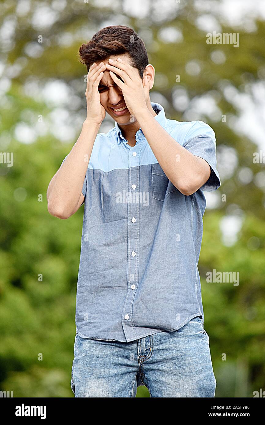 Sad Male Teenager Stock Photo - Alamy