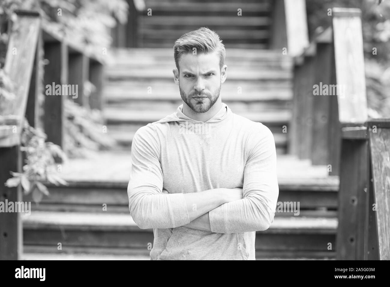 Overcome any obstacles. Sportsman lifestyle. Handsome athlete stairs ...