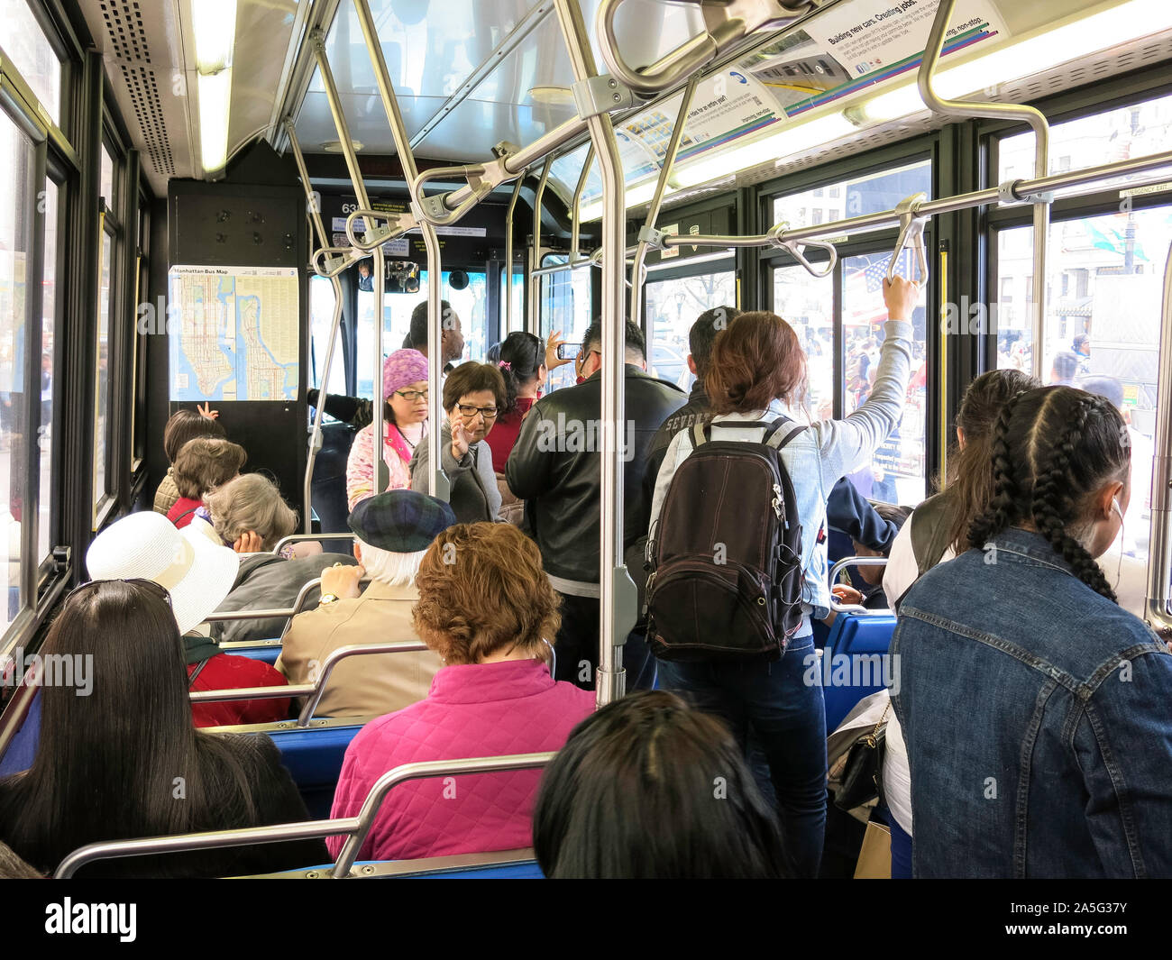 Bus passengers seated hi-res stock photography and images - Alamy