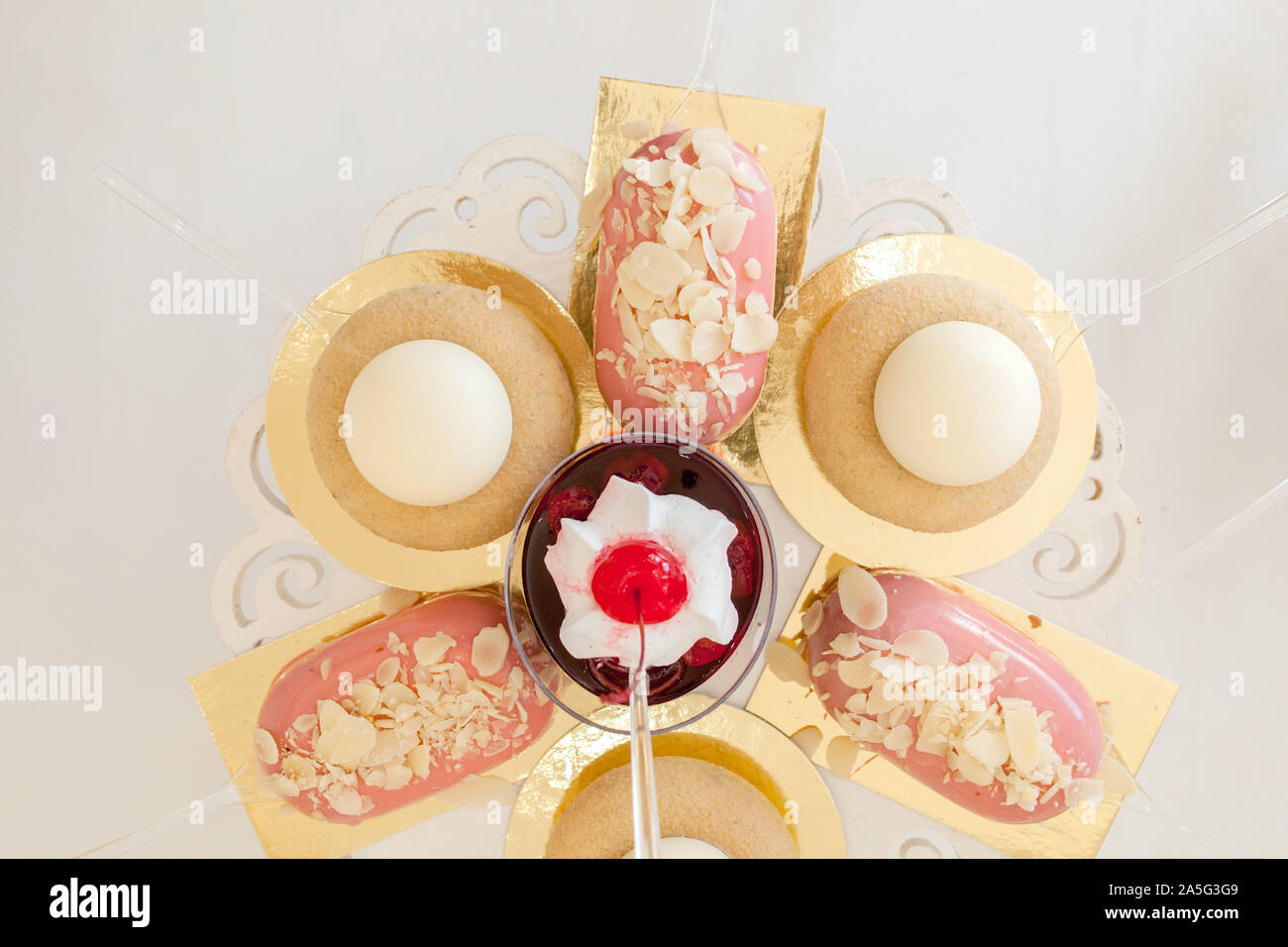 Desserts with fruits, mousse, biscuits. Different types of sweet ...