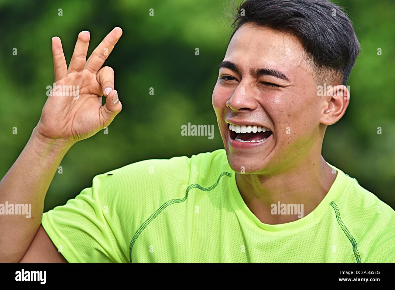 Fitness Adult Male Athlete And Okay Sign Stock Photo - Alamy