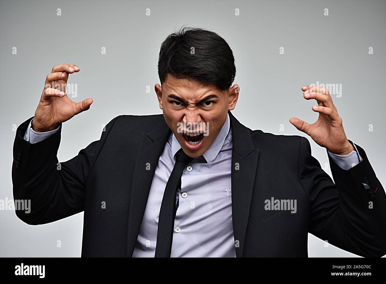 Stressful Minority Business Man Wearing Suit And Tie Stock Photo - Alamy