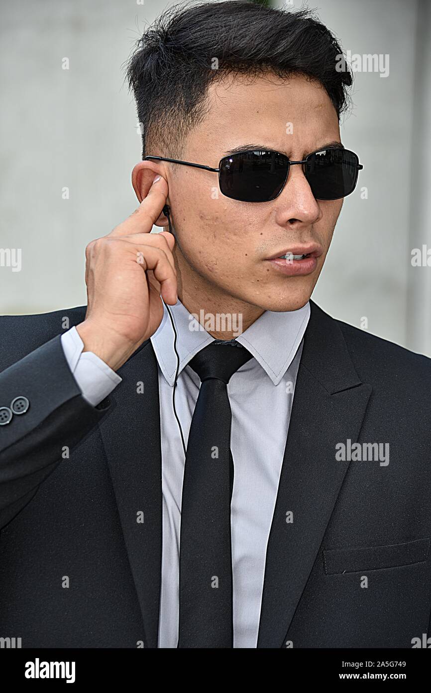 Unemotional Diverse Security Guard Wearing Sunglasses Stock Photo - Alamy