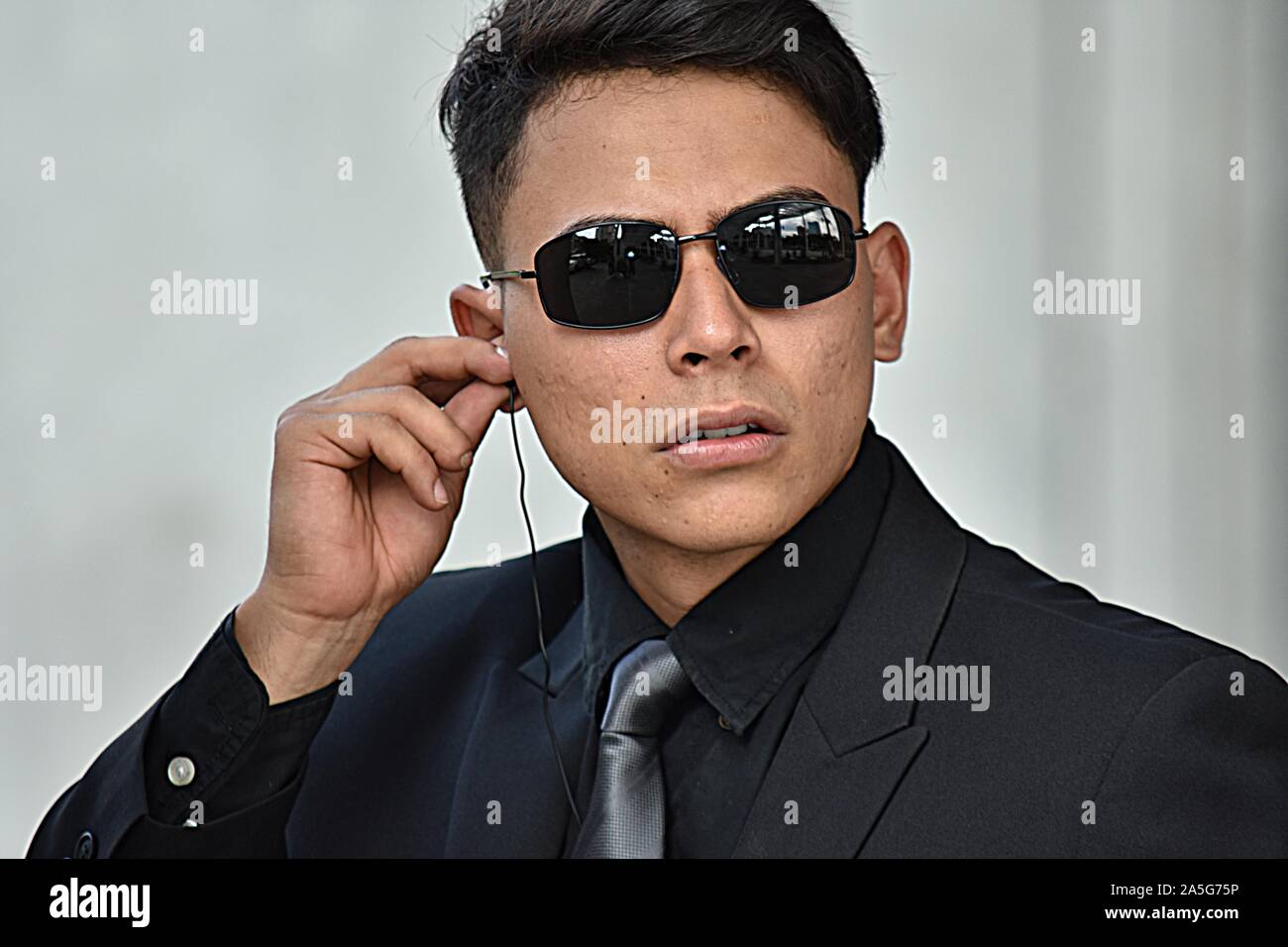 Serious Security Guard Spy Stock Photo - Alamy