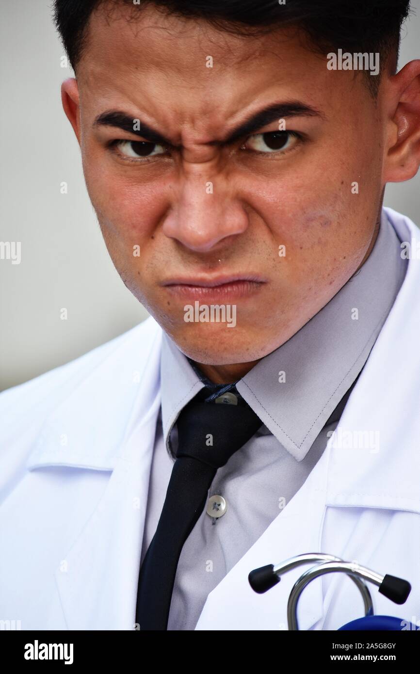 An Angry Adult Male Doctor Stock Photo - Alamy