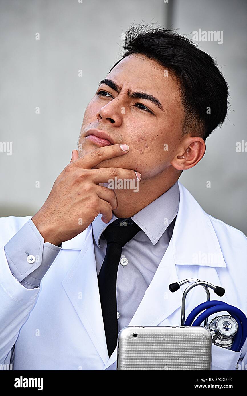 Doctor thinking hi-res stock photography and images - Alamy