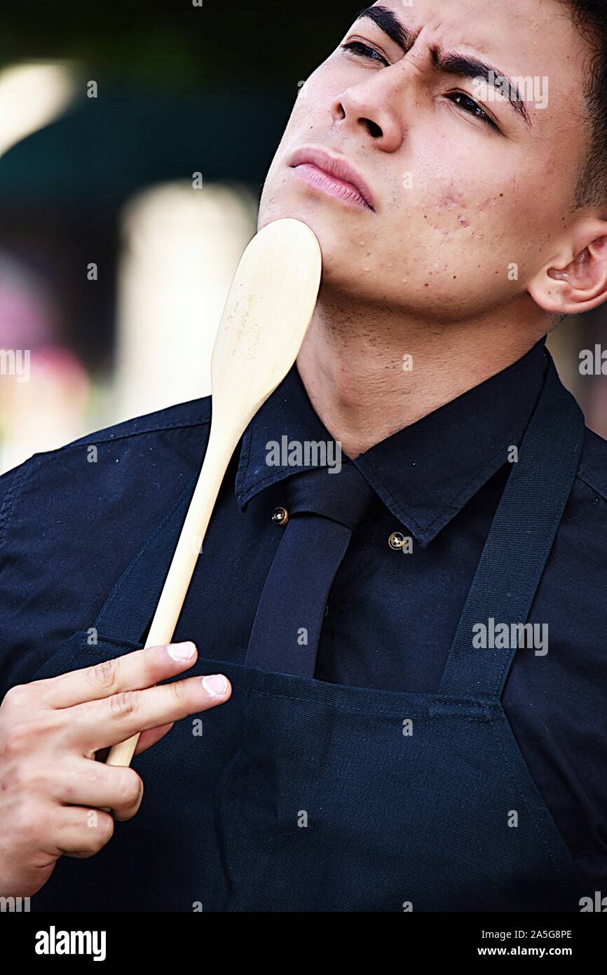 An Adult Male Chef Thinking Stock Photo - Alamy