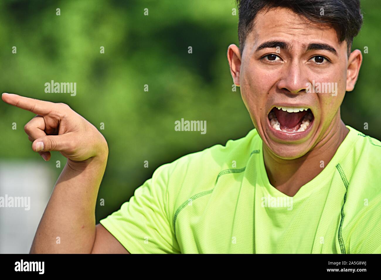 An Athletic Man Pointing Stock Photo - Alamy