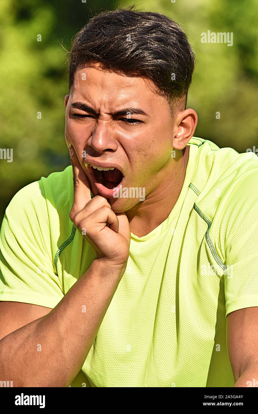An Adult Male Athlete With Toothache Stock Photo - Alamy