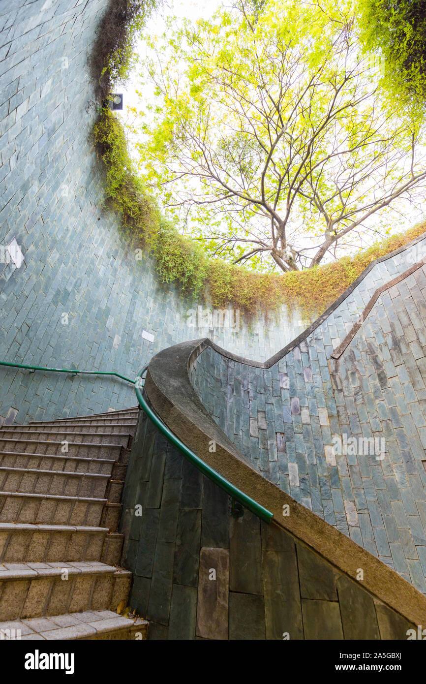 Spiral staircase of underground crossing in tunnel at Fort Canning Park ...
