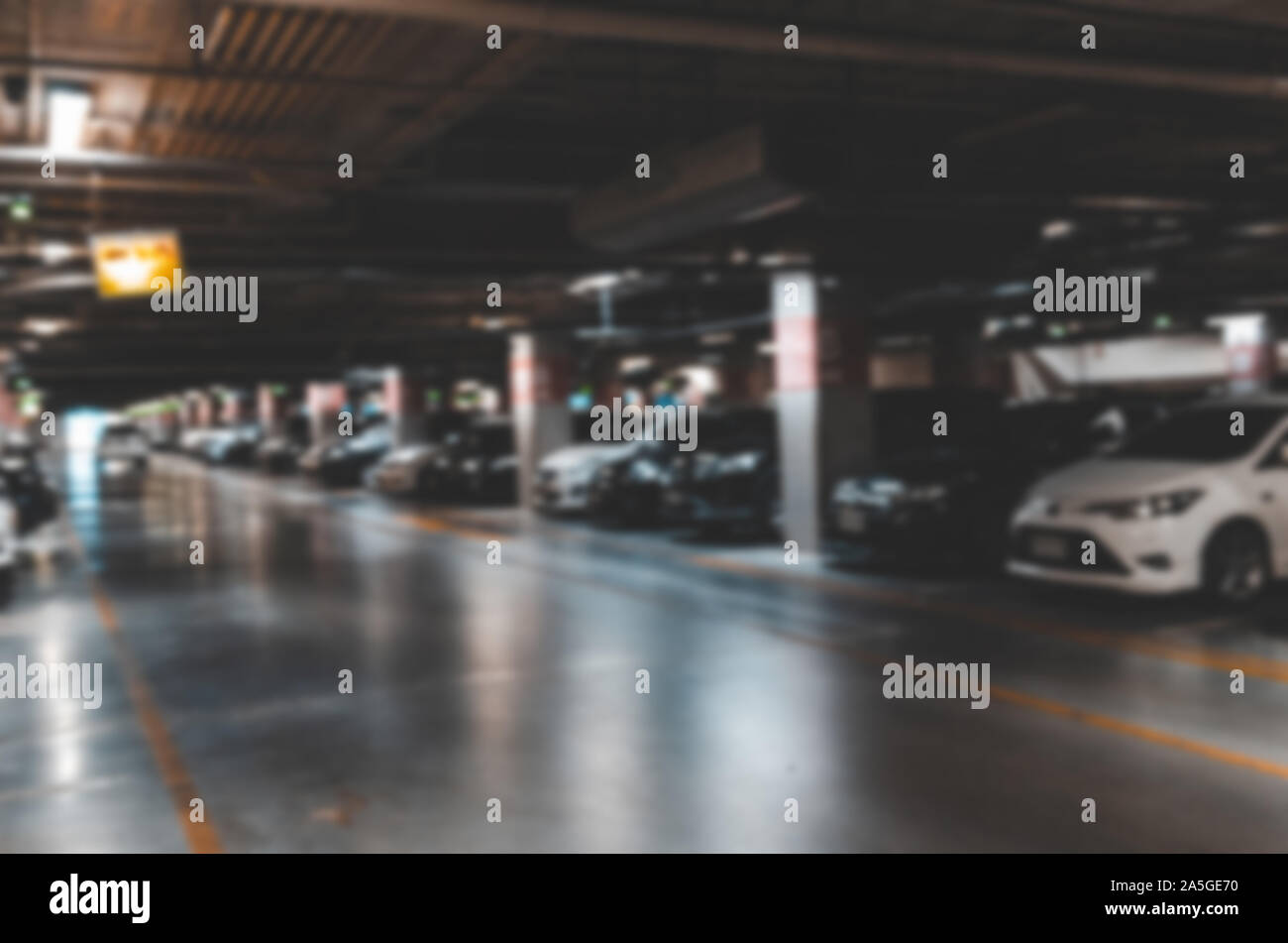 Abstract blurred parking lot in the building. Used as a product ...