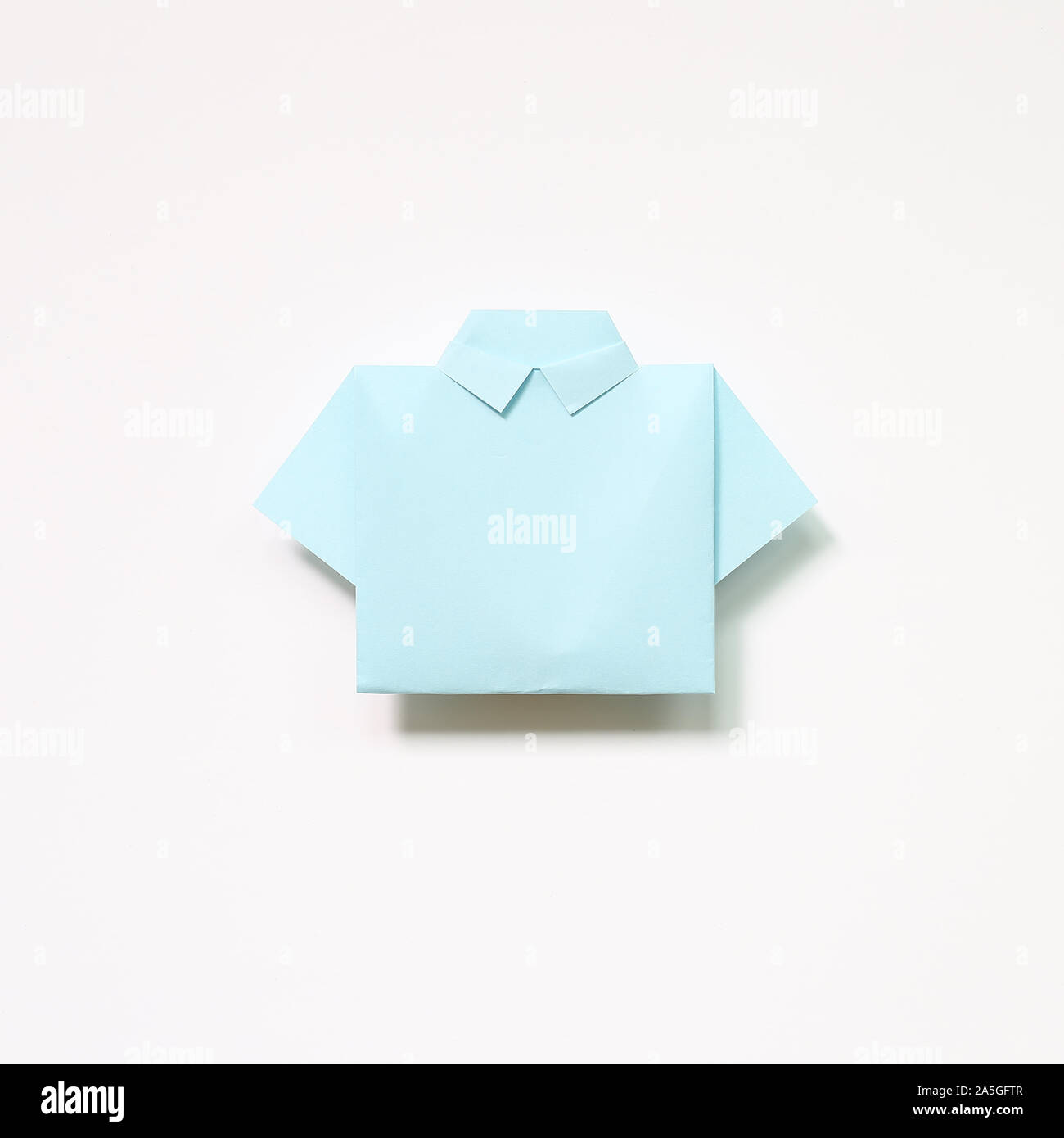 White origami paper shirt hi-res stock photography and images - Alamy