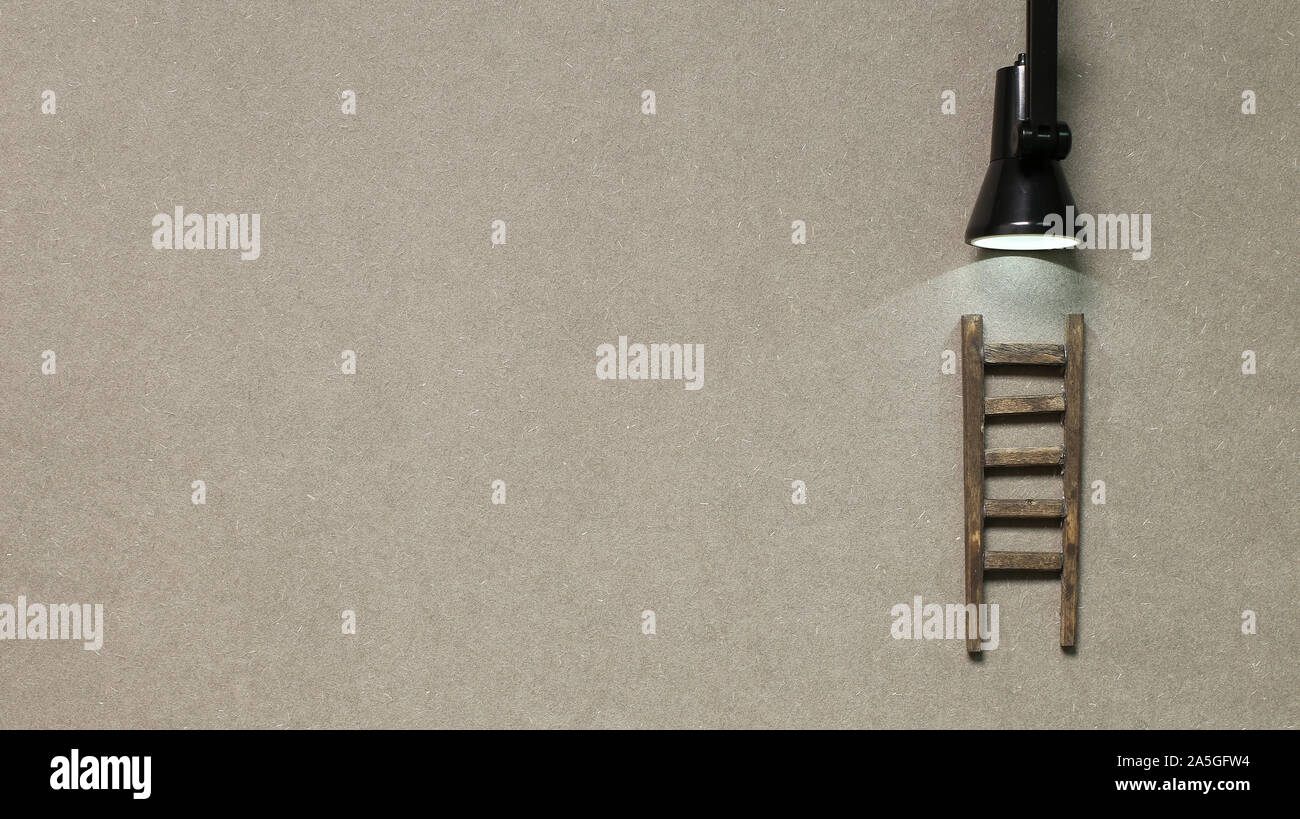 Wooden ladder with lamp light. Development, challenge, success concept ...