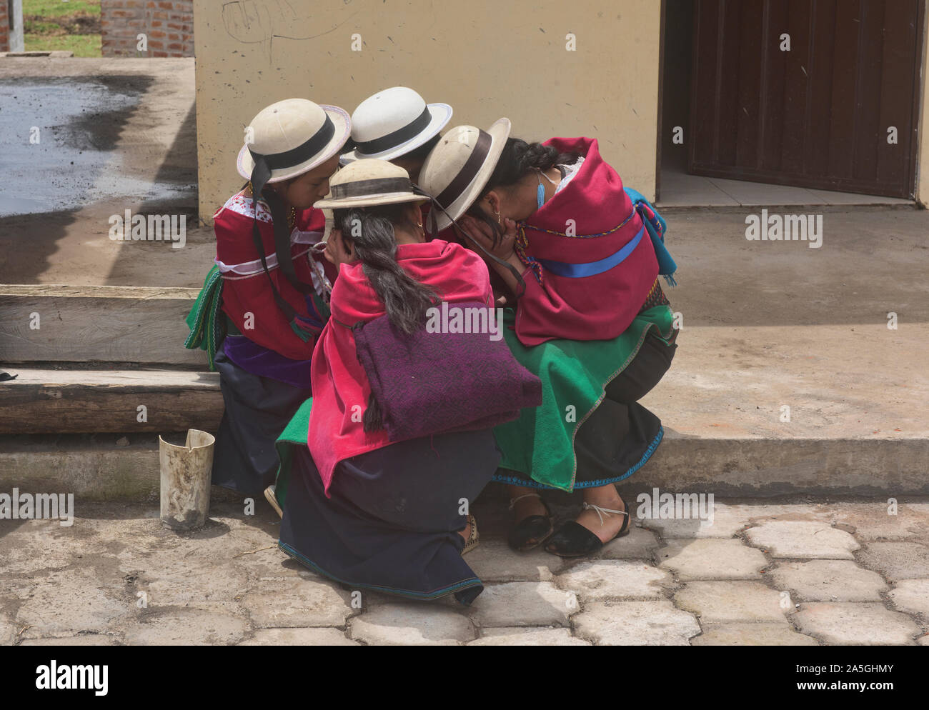 Group of indigenous girls with hats, La Moya, Ecuador Stock Photo - Alamy