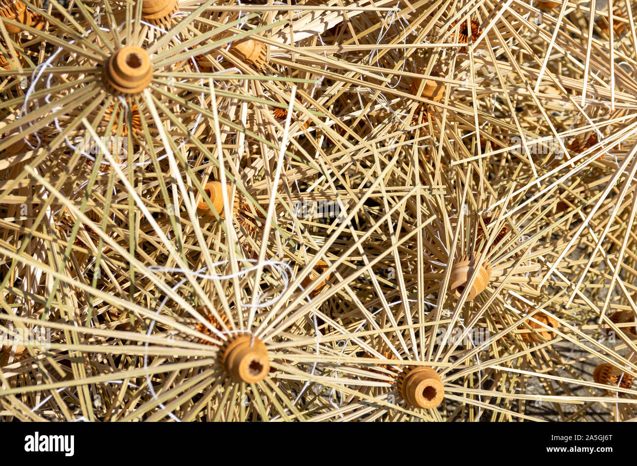 Wooden racks for traditional thai umbrellas - close up Stock Photo - Alamy