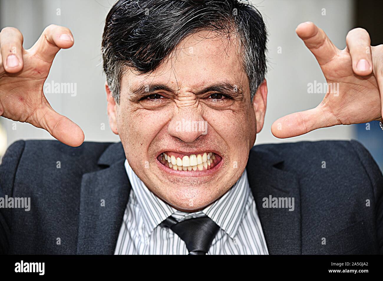 Stressed Business Executive Wearing Suit And Tie Stock Photo - Alamy